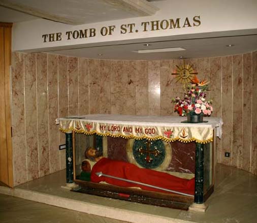 Praying before a box with a skeleton named “St.Thomas”